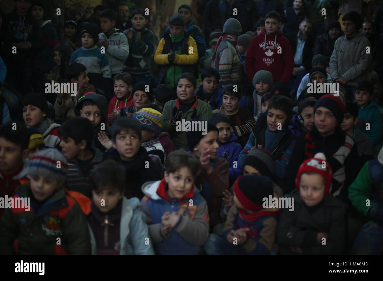 Orphan Syrian children in a playground build underground to protect ...