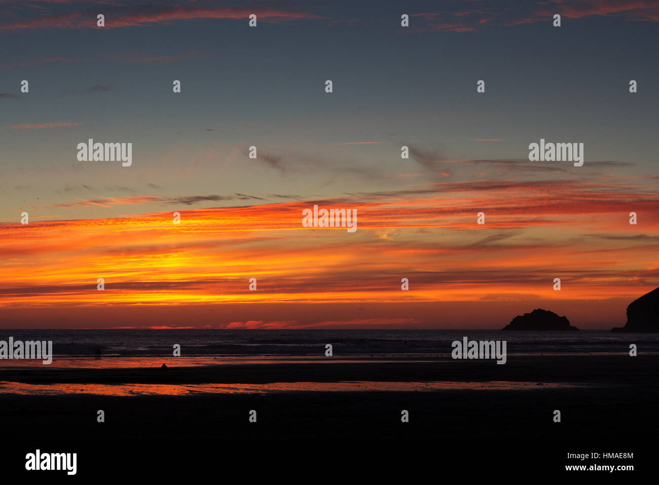 Colourful sunset over the beach at Polzeath, Cornwall Stock Photo - Alamy