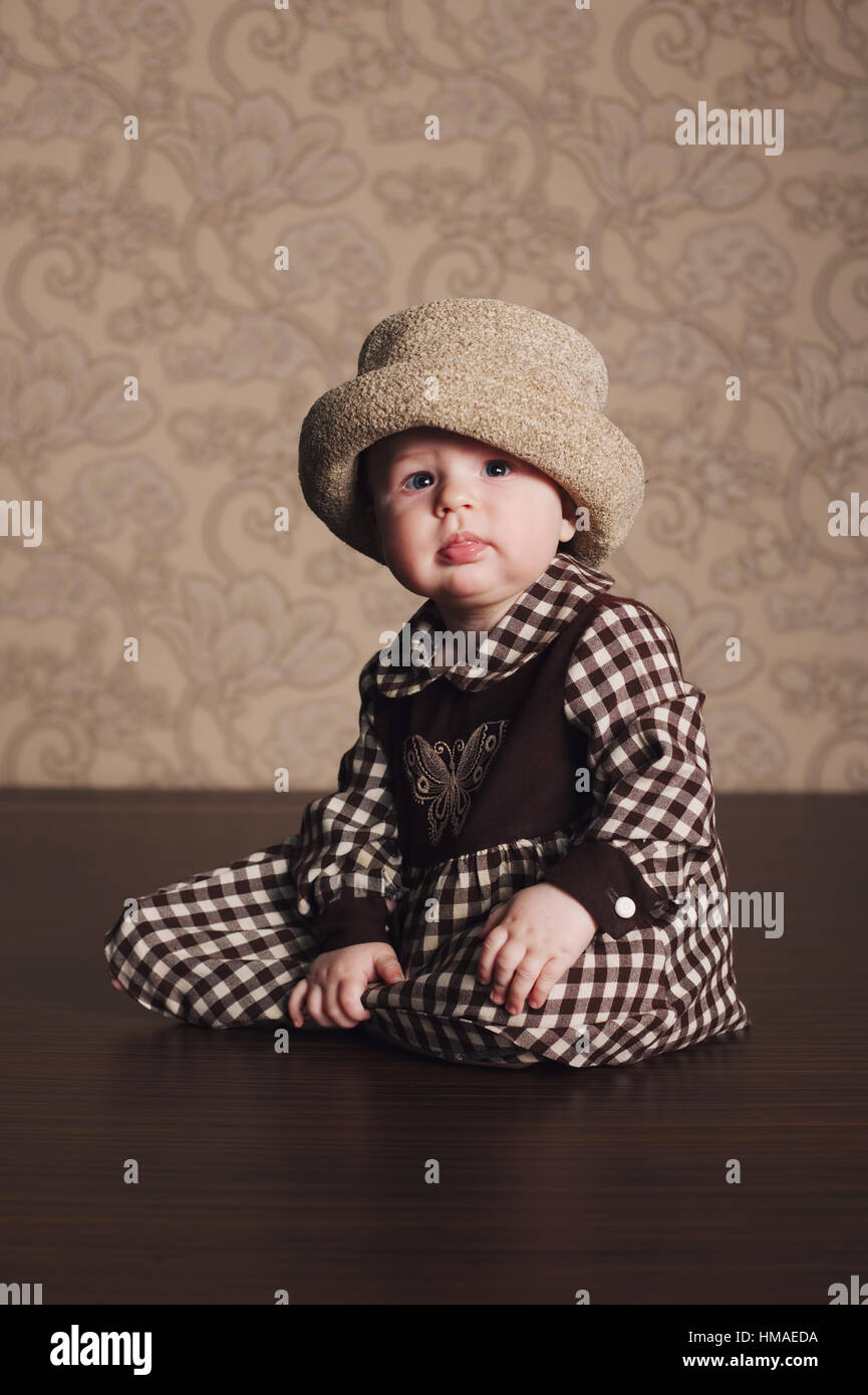 little funny girl in retro dress Stock Photo - Alamy