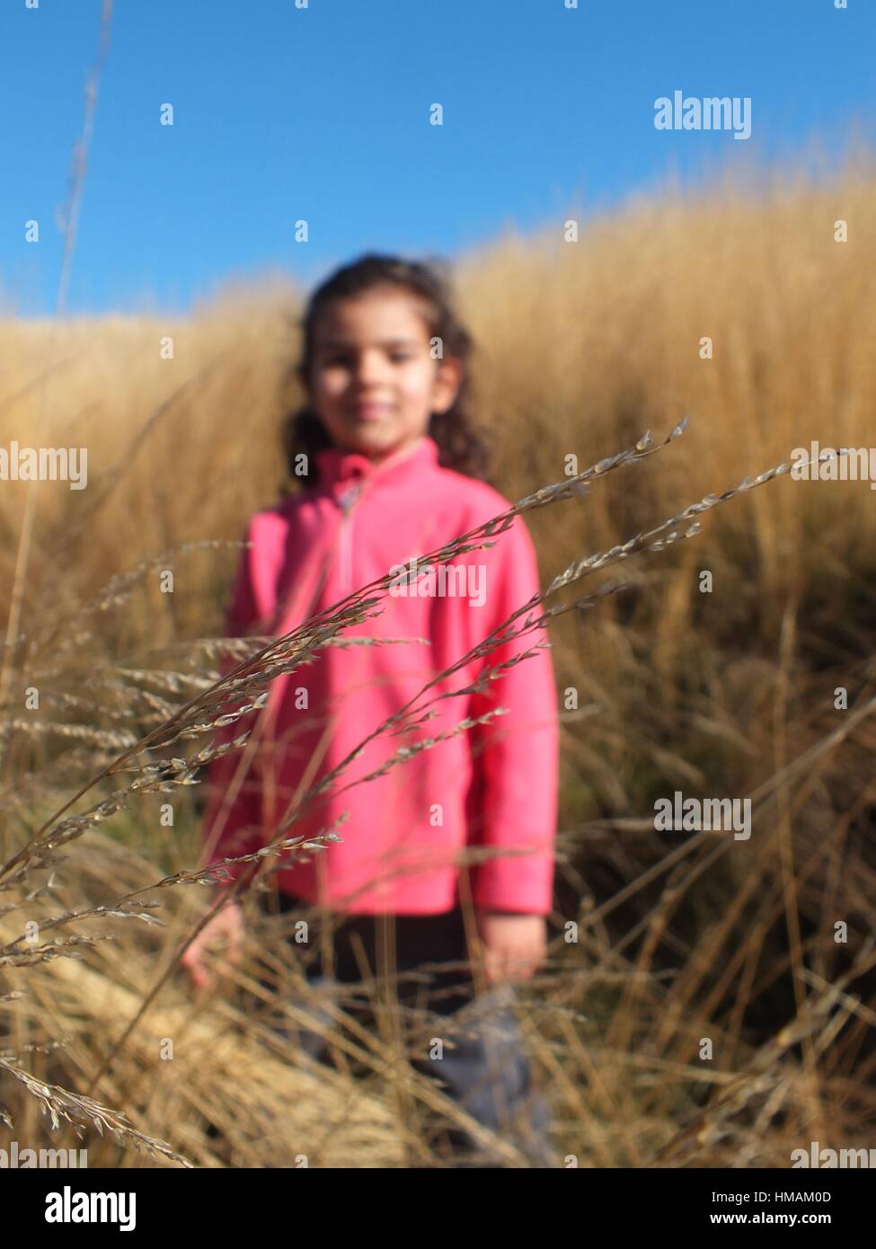 Girl posing behind hi-res stock photography and images - Alamy