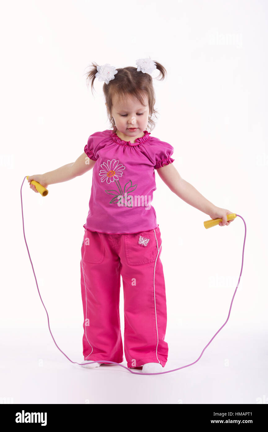 Little girl jumping rope hi-res stock photography and images - Alamy