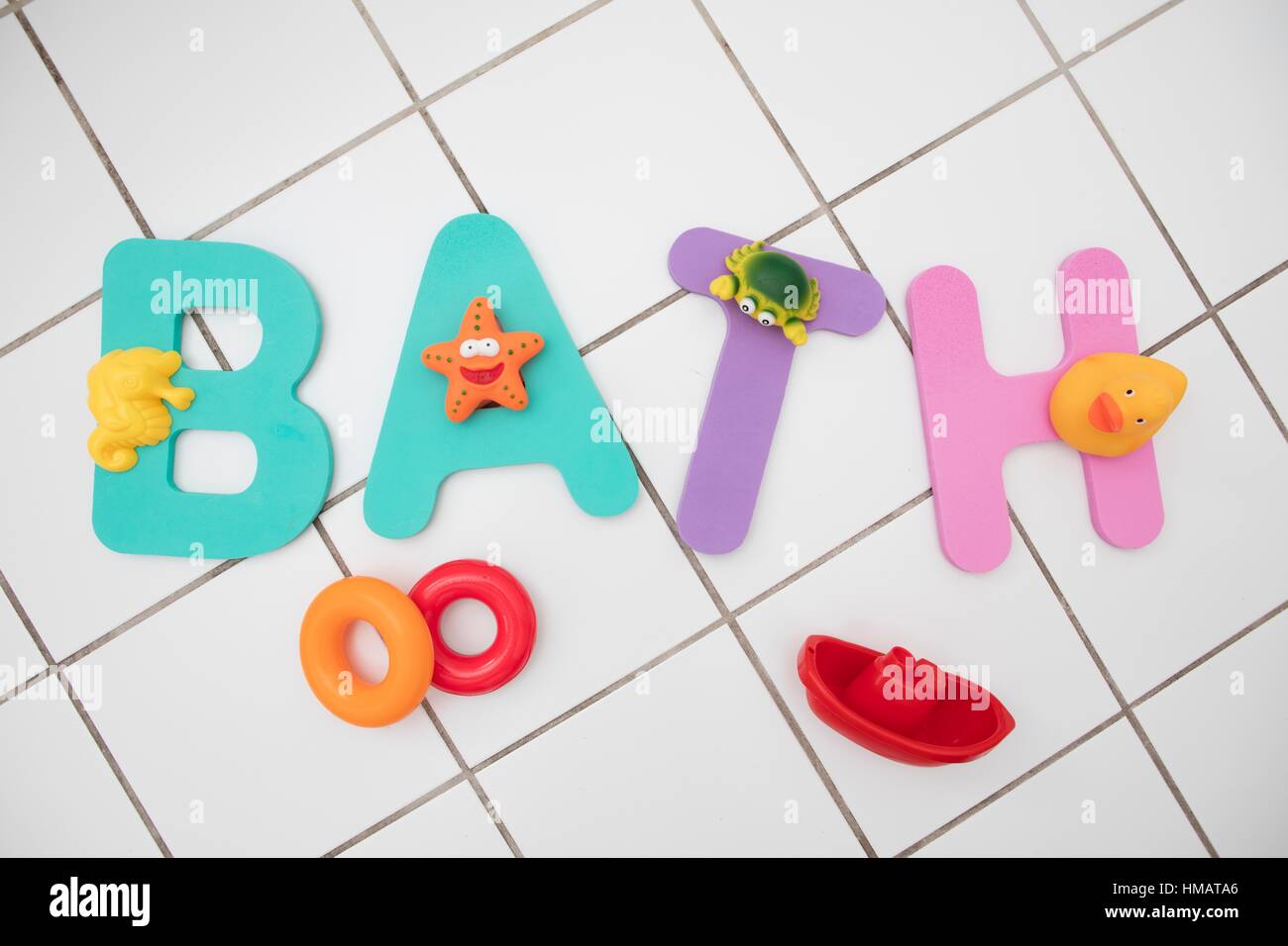 Children with letters hi-res stock photography and images - Alamy