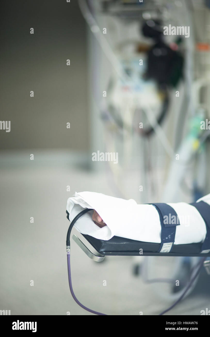 Hospital ward emergency room operating theater, patient bed and modern ...