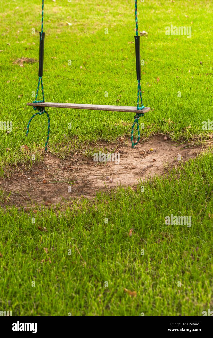 Empty motionless swing hi-res stock photography and images - Alamy