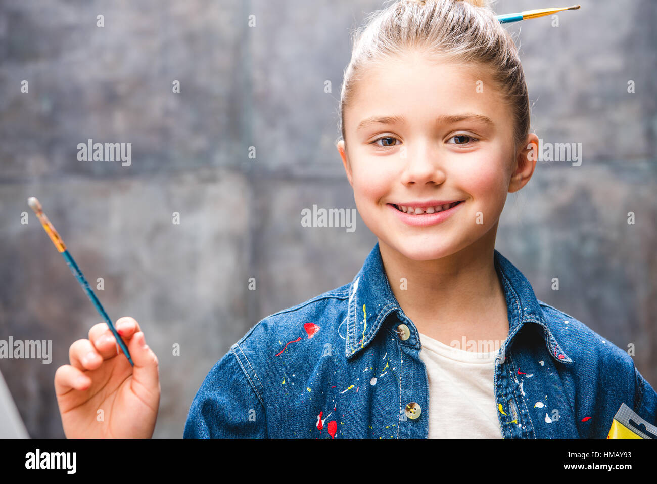 Little artist painting Stock Photo - Alamy