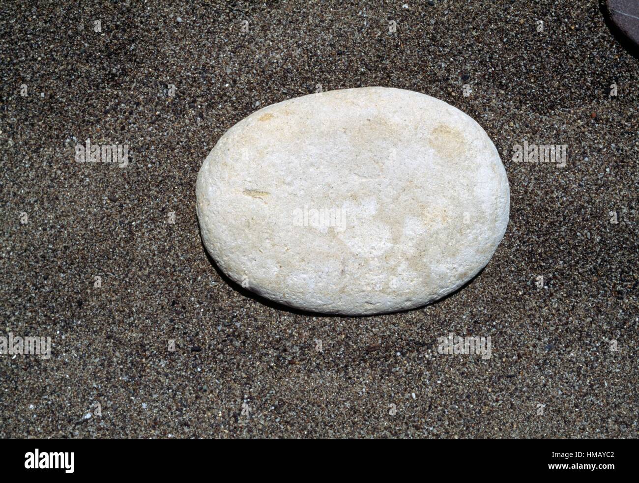 Round white rock on sand, Keratokambos, Crete, Greece Stock Photo - Alamy