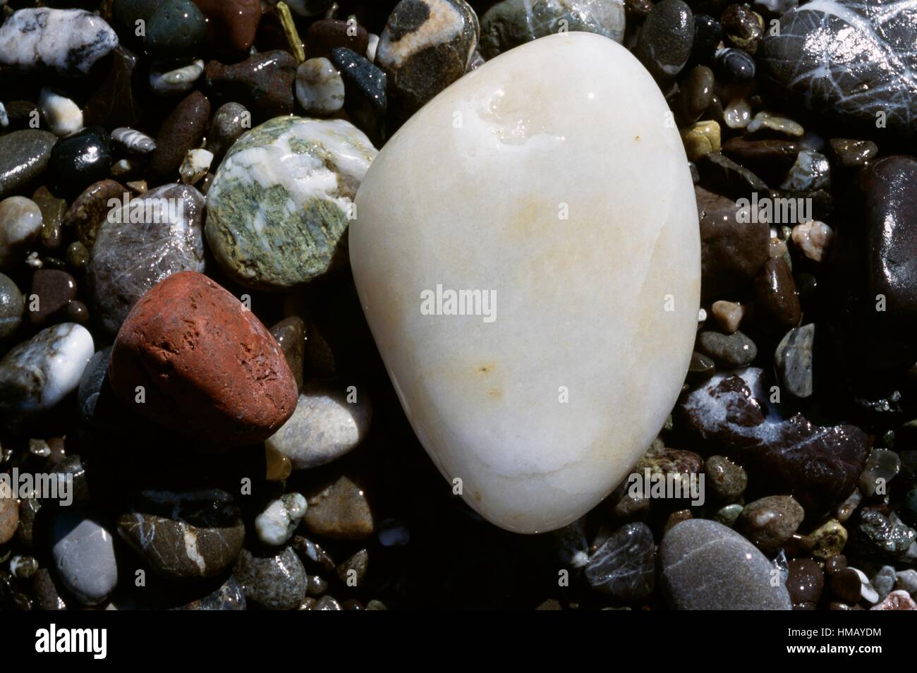 White rock and coloured stones, Keratokambos, Crete, Greece Stock Photo ...