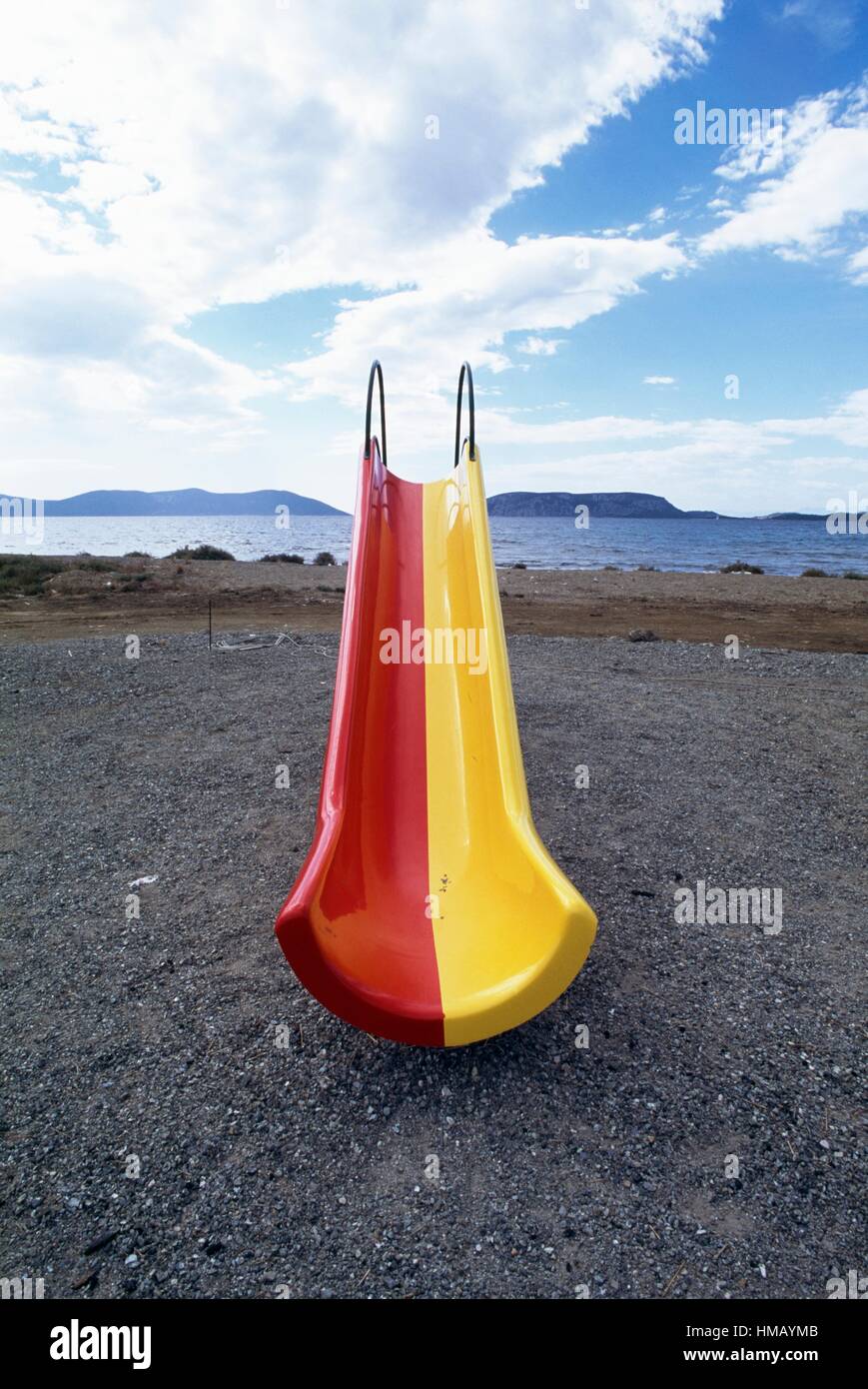 Slippery slide in a playground on the beach in Ermioni, Peloponnese ...