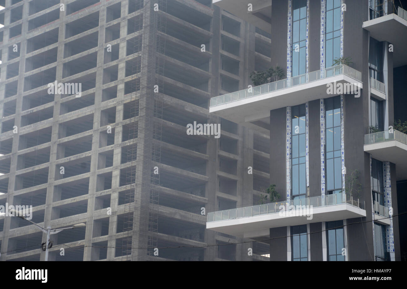 Kolkata, India. 01st Feb, 2017. Residential buildings stand under ...