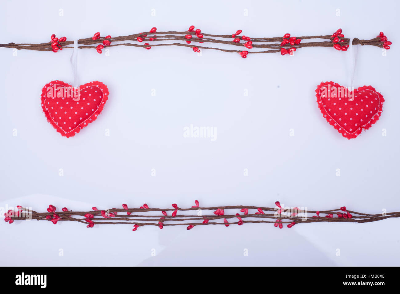 Two beautiful red hearts on a white background Stock Photo - Alamy