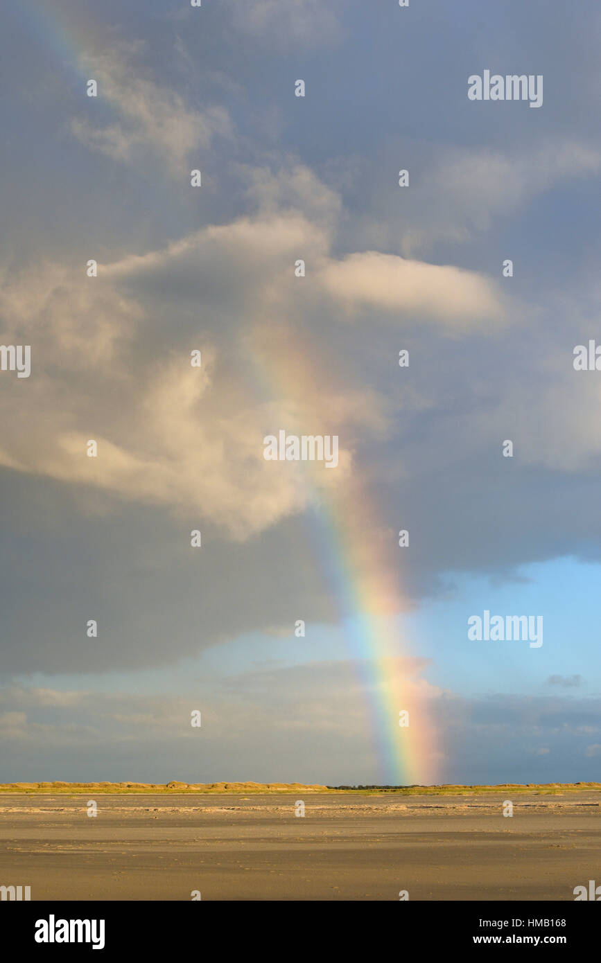 Rainbow over dunes, Sankt Peter-Ording, Schleswig-Holstein Wadden Sea ...