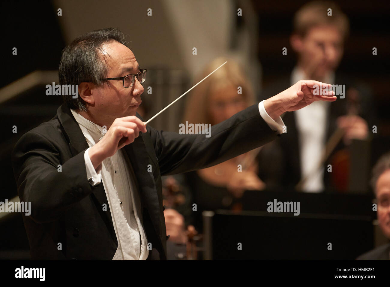 Asian conductor hi-res stock photography and images - Alamy