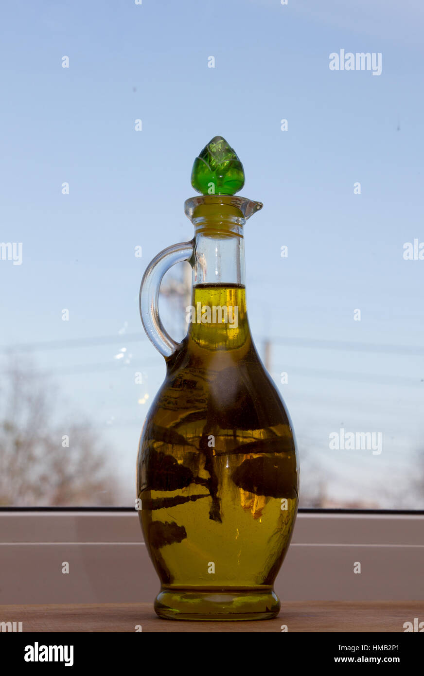 Olive oil in a beautiful bottle Stock Photo - Alamy