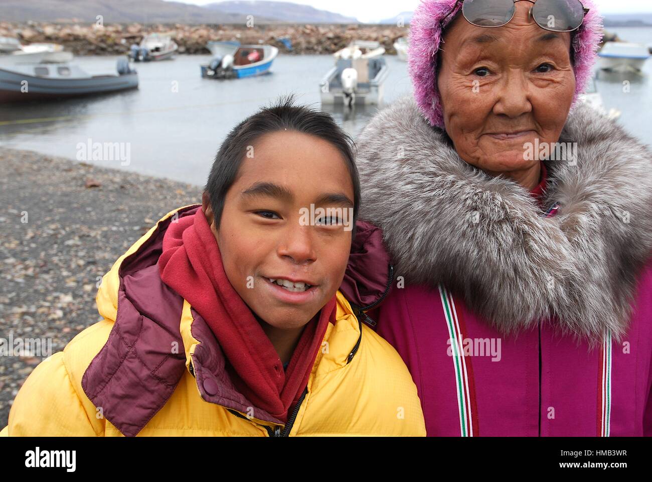 Inuit family. Coastal Inuit community of Arctic Bay. Lancaster Sound ...