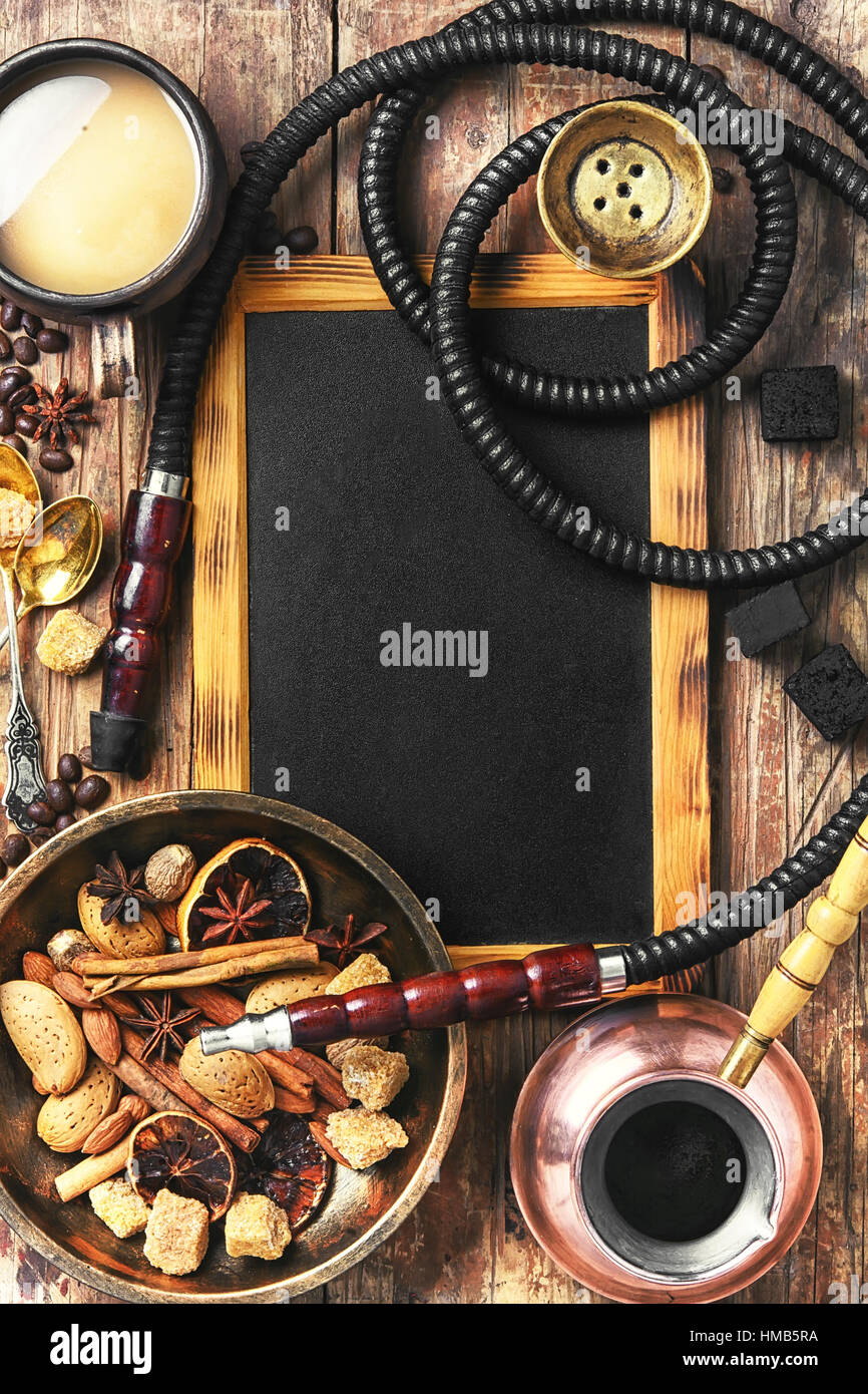 Arab shisha with coffee flavor and chalk board Stock Photo - Alamy
