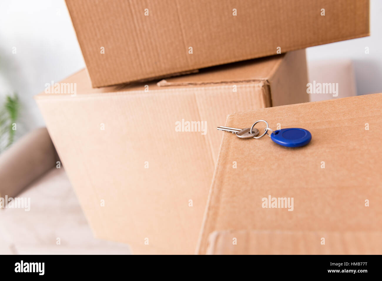 Close up of boxes and keys Stock Photo - Alamy