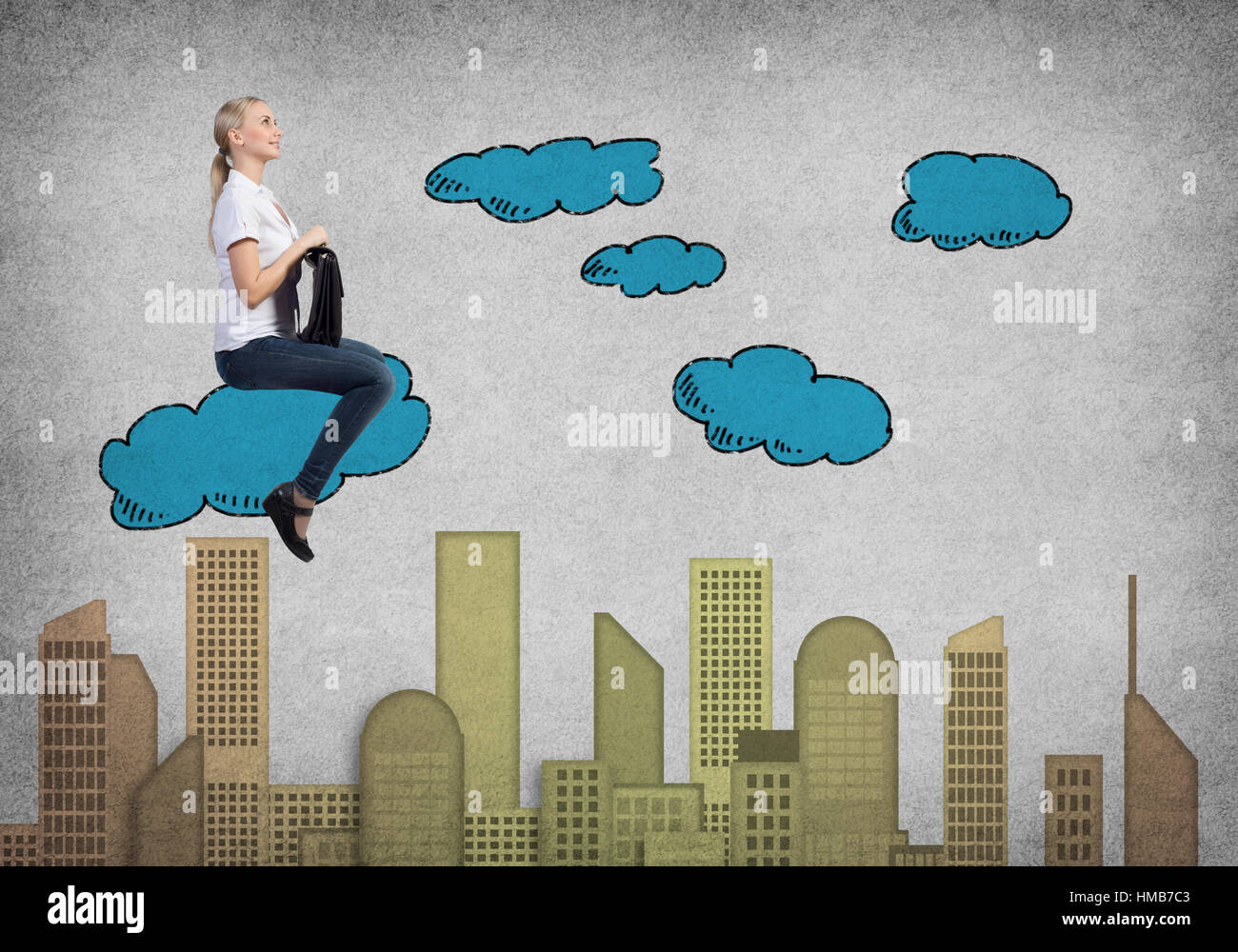 Girl riding cloud Stock Photo - Alamy