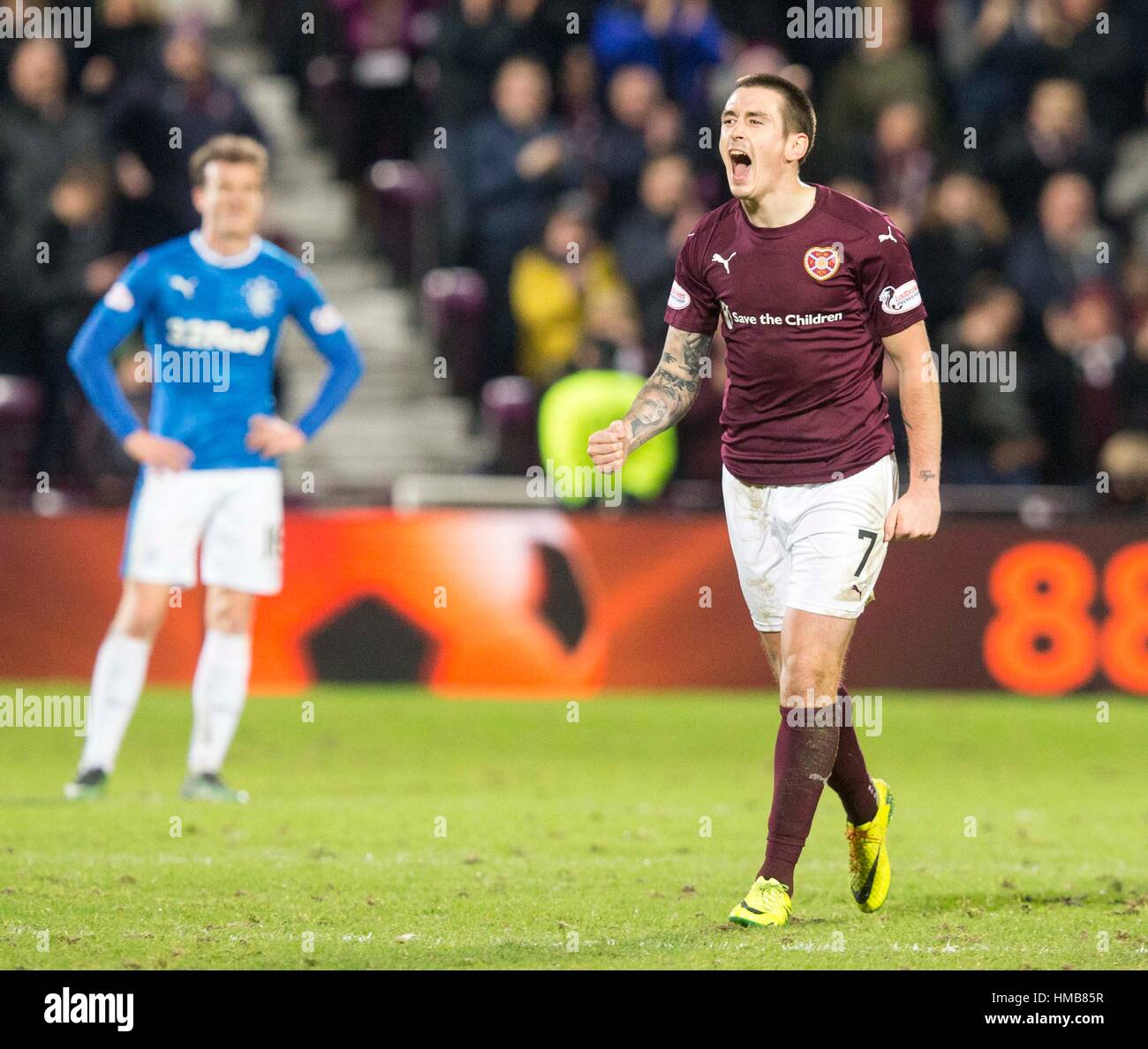 Hearts' Jamie Walker celebrates scoring his side's fourth goal of the ...