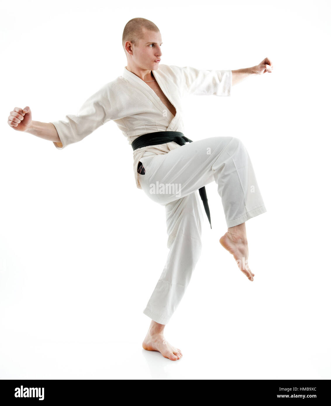 Man standing in black karate Cut Out Stock Images & Pictures - Alamy