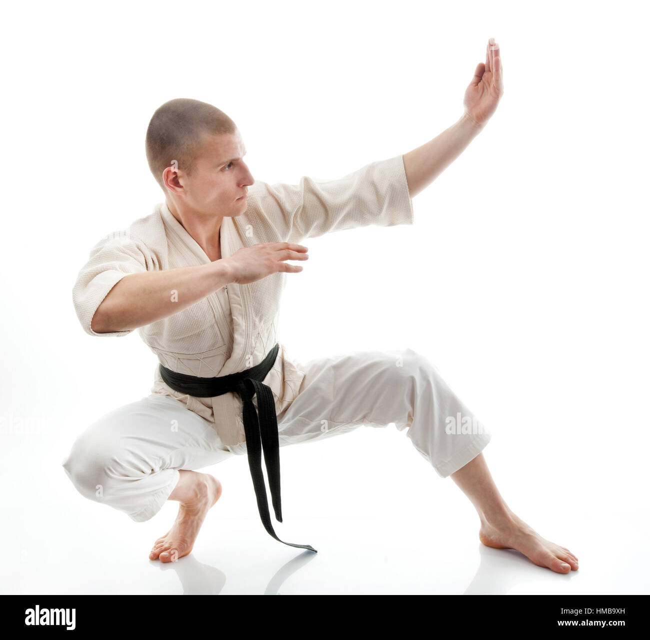 Man standing in black karate Cut Out Stock Images & Pictures - Alamy