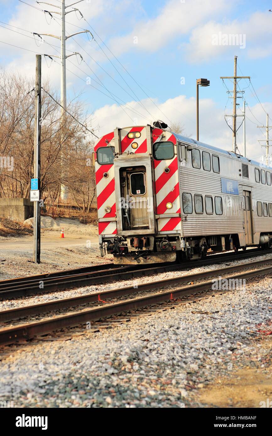 A Metra commuter train passing through Elgin, Illinois on its journey ...