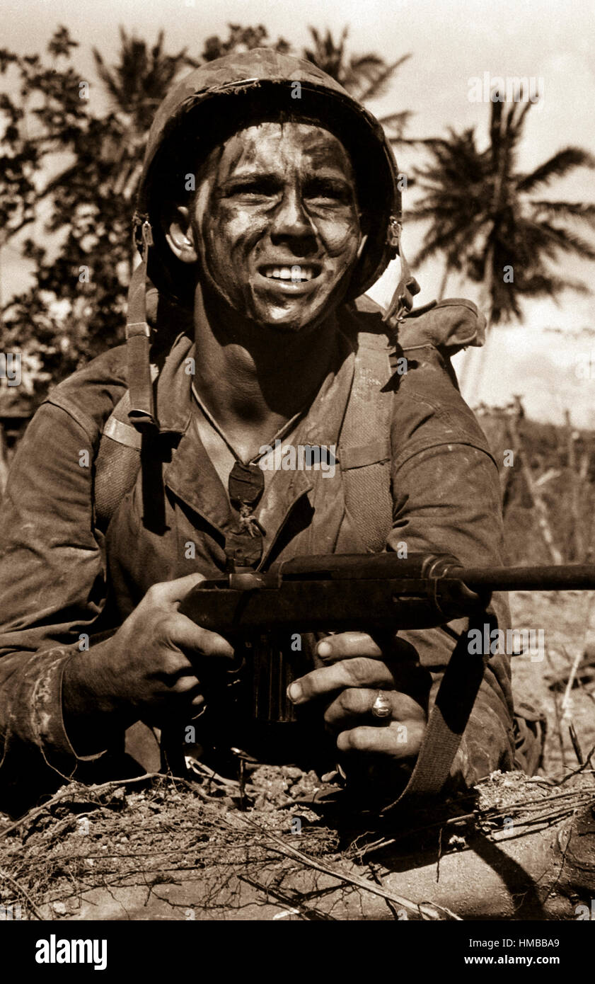 Marine awaits signal to go ahead in battle to recapture Guam from Japs ...