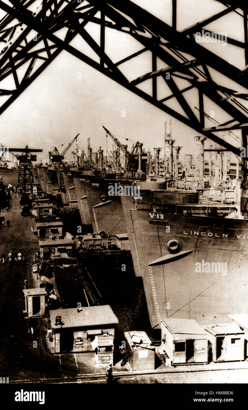Victory cargo ships are lined up at a U.S. west coast shipyard for ...