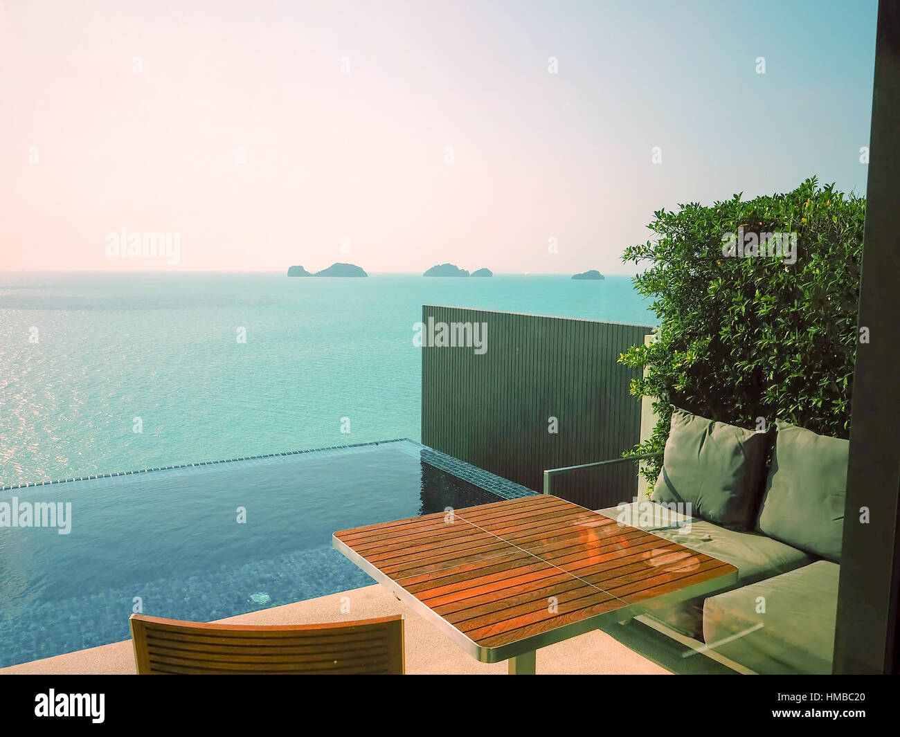 Cafe and swimming pool at a tropical beach Stock Photo - Alamy