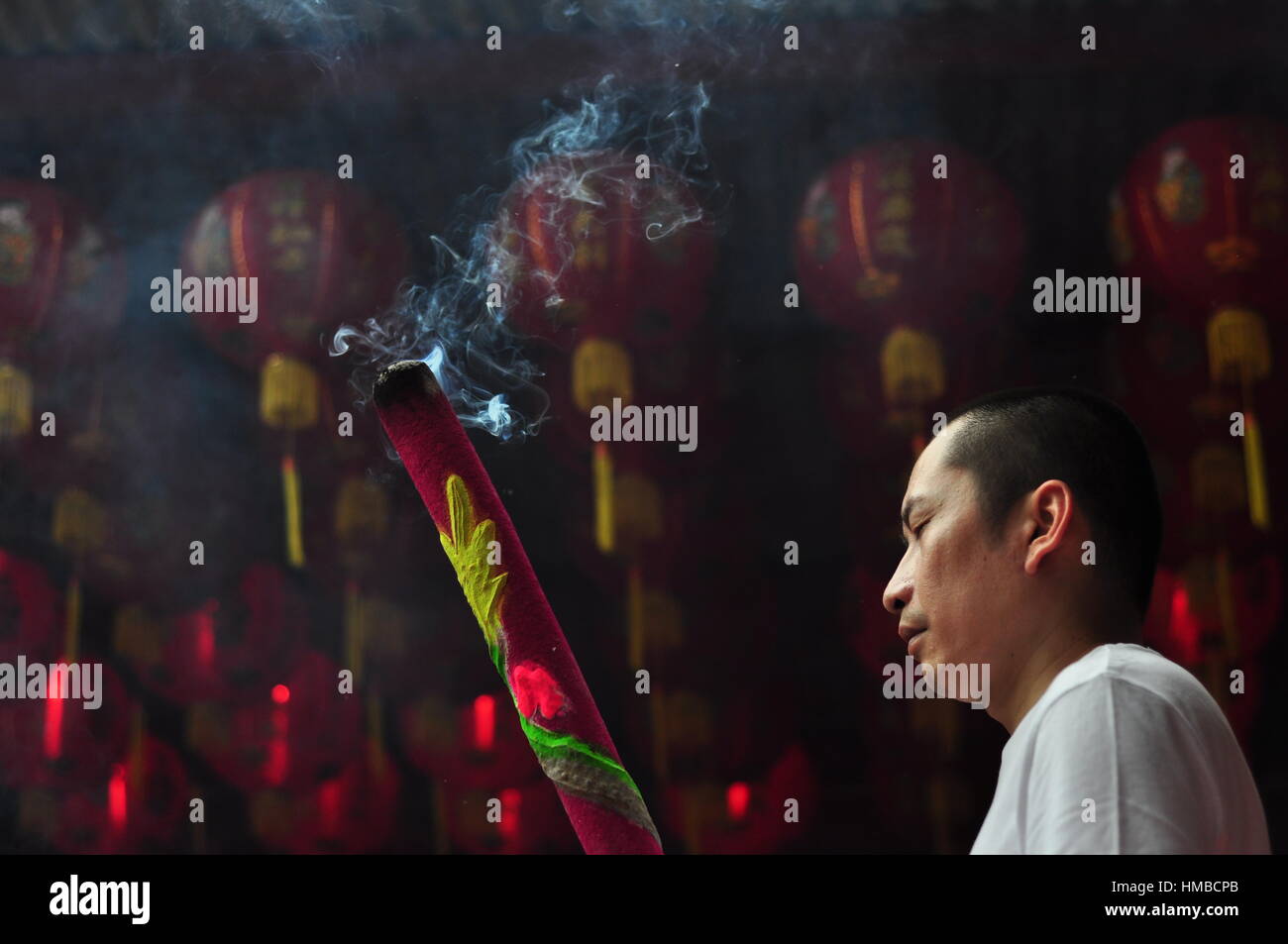 Jakarta, Indonesia - January 29, 2017: Chinese people with big incense ...