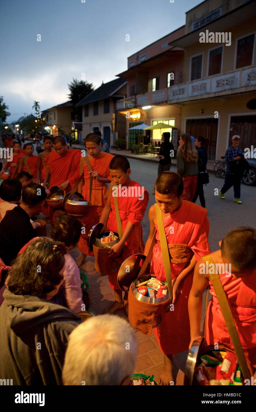 Buddhist alms giving, Luang Prabang Stock Photo - Alamy