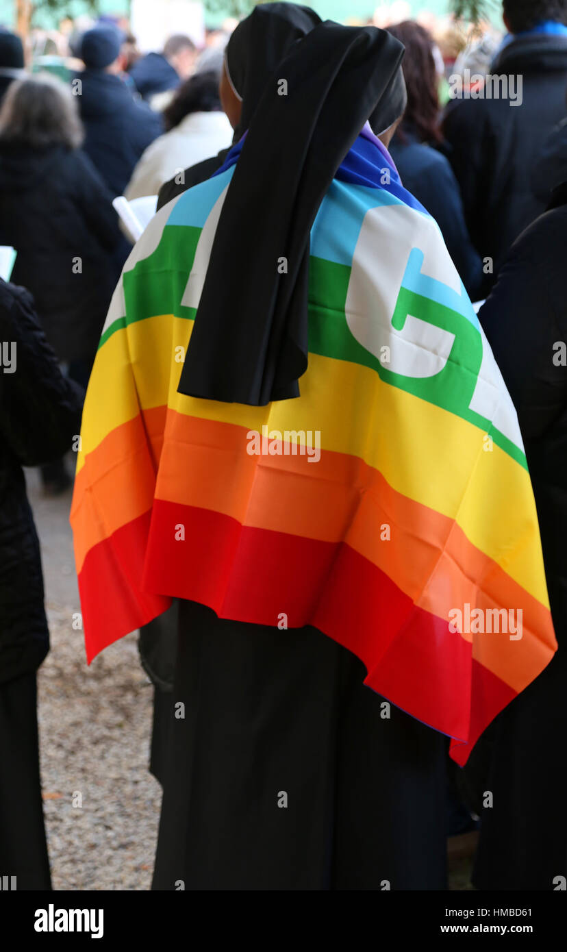 nun with black veil and flag with peace message Stock Photo - Alamy