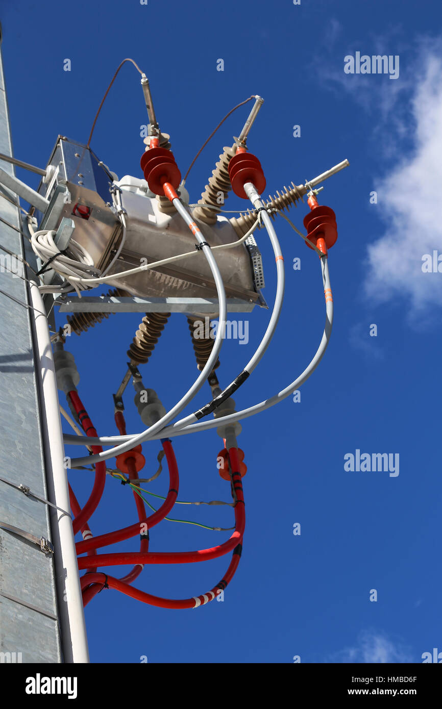 cables and high voltage insulators of a voltage transformer Stock Photo ...