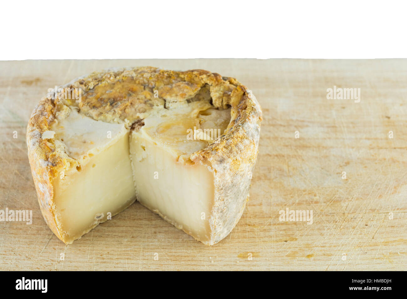 The form of hard cheese of a bloomy rind goat's milk, frost crust ...