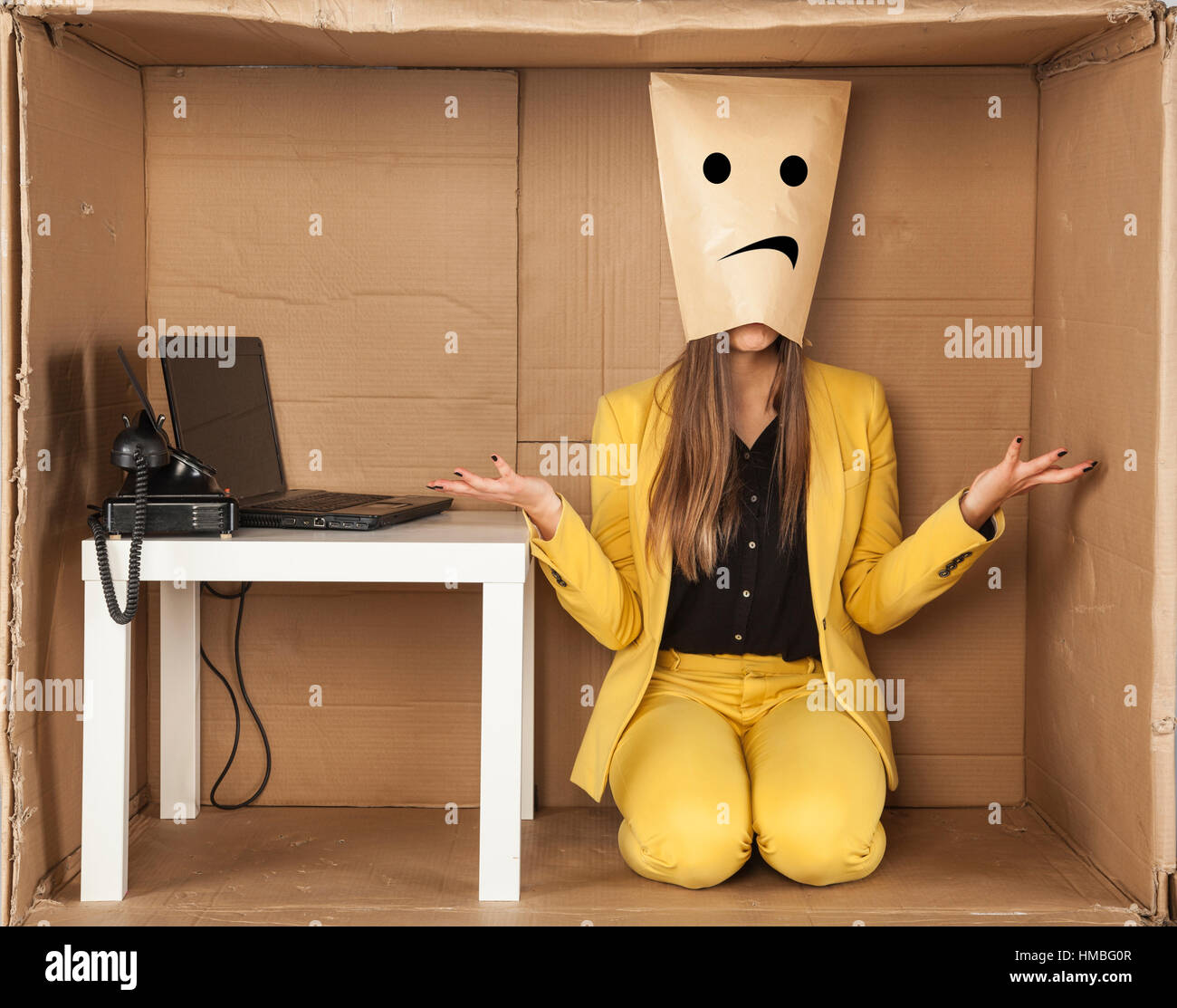 Woman face covered paper bag hi-res stock photography and images - Alamy