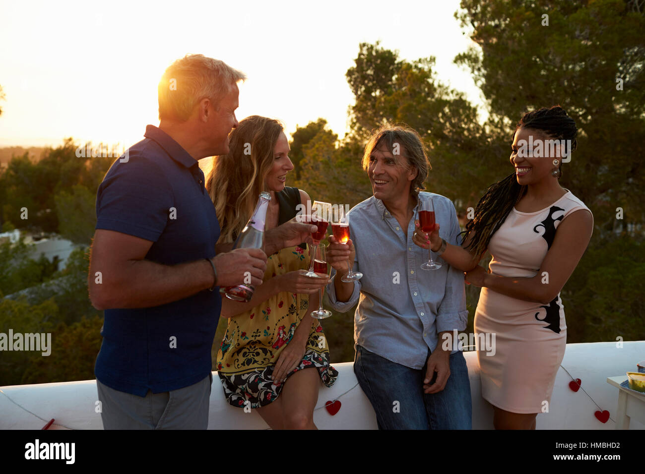 Two mature couples sitting on hi-res stock photography and images - Alamy
