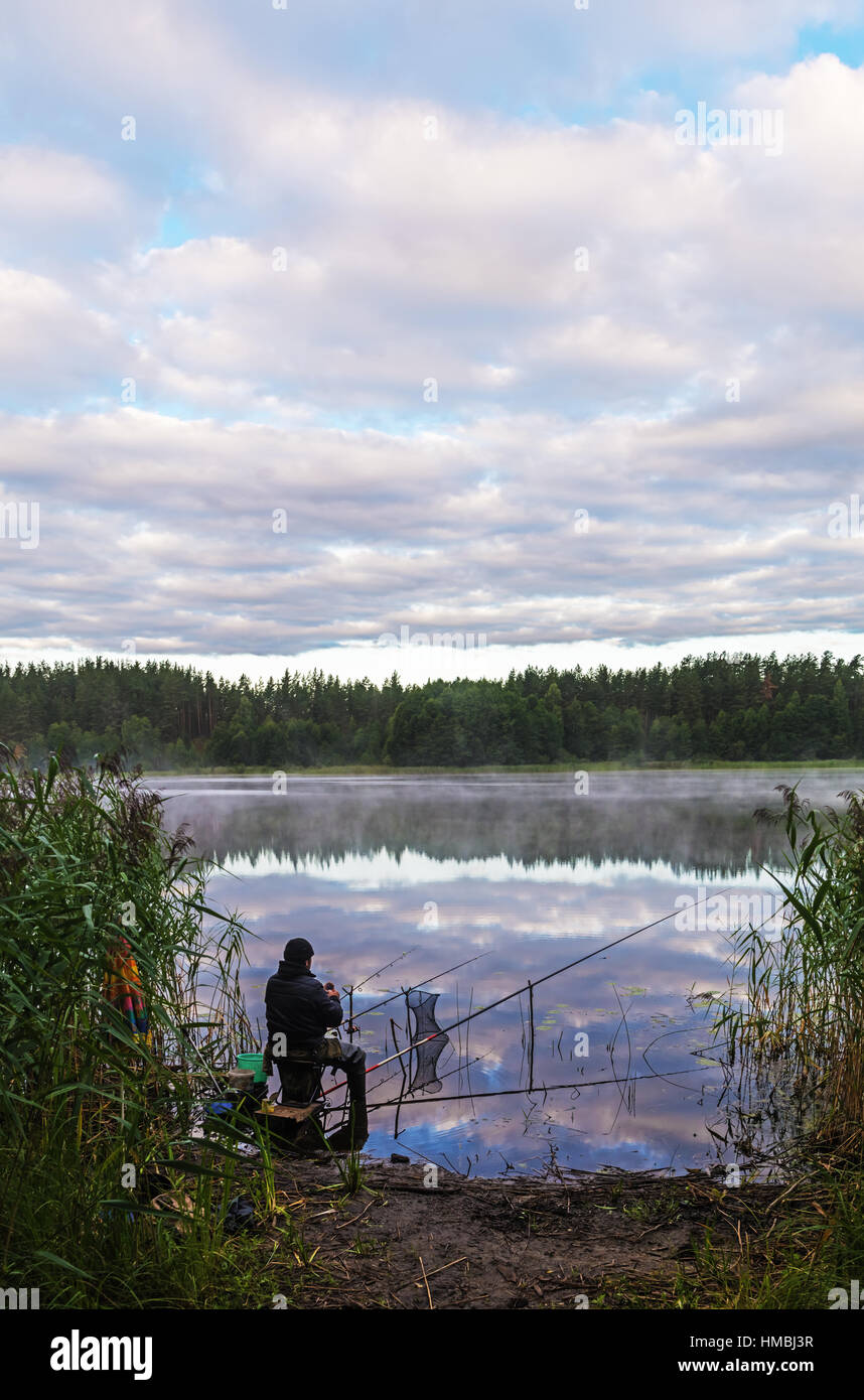 Fishing on the lake Stock Photo - Alamy
