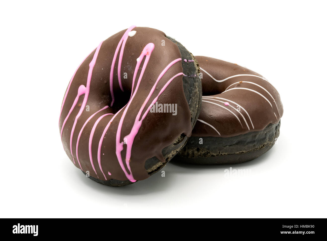 Two sweet donuts isolated on white background Stock Photo - Alamy