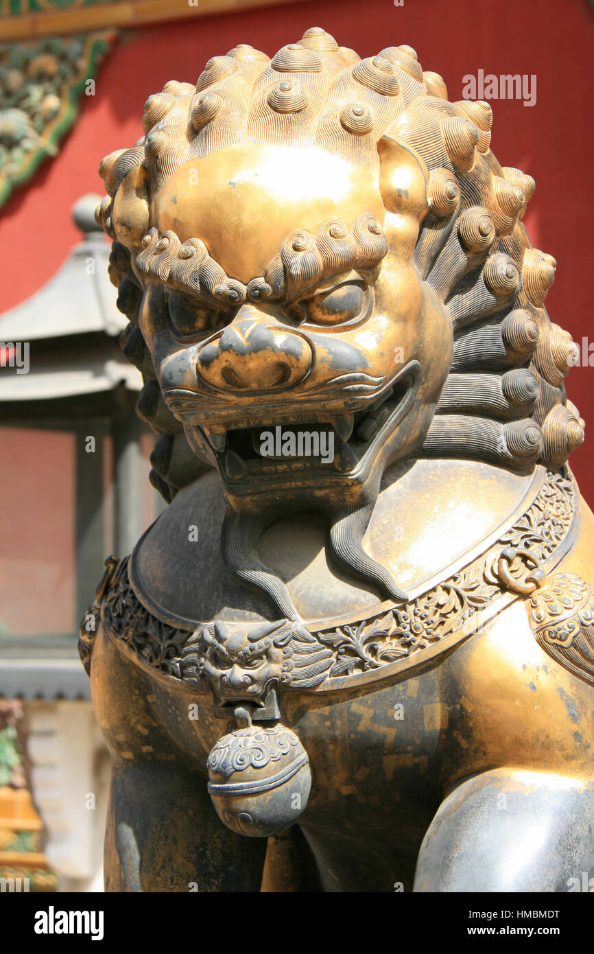 Statue of a Chinese guardian lion in the Forbidden City in Beijing ...