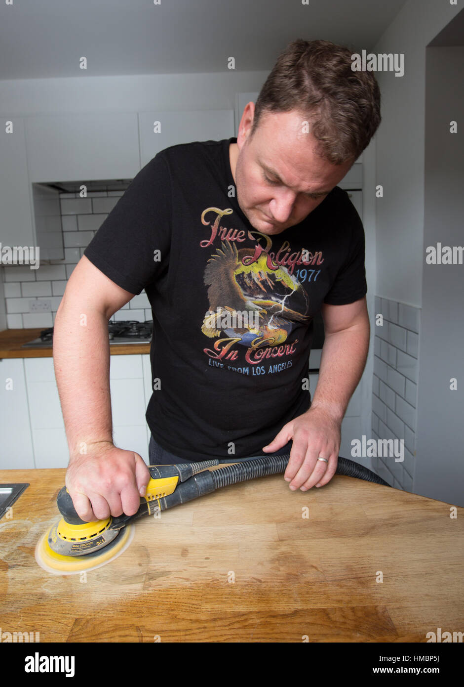 Man doing DIY Stock Photo - Alamy