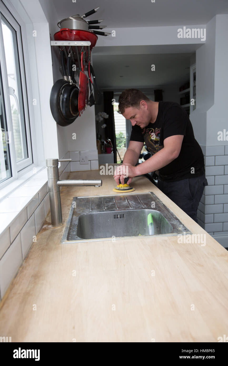 Man doing DIY Stock Photo - Alamy