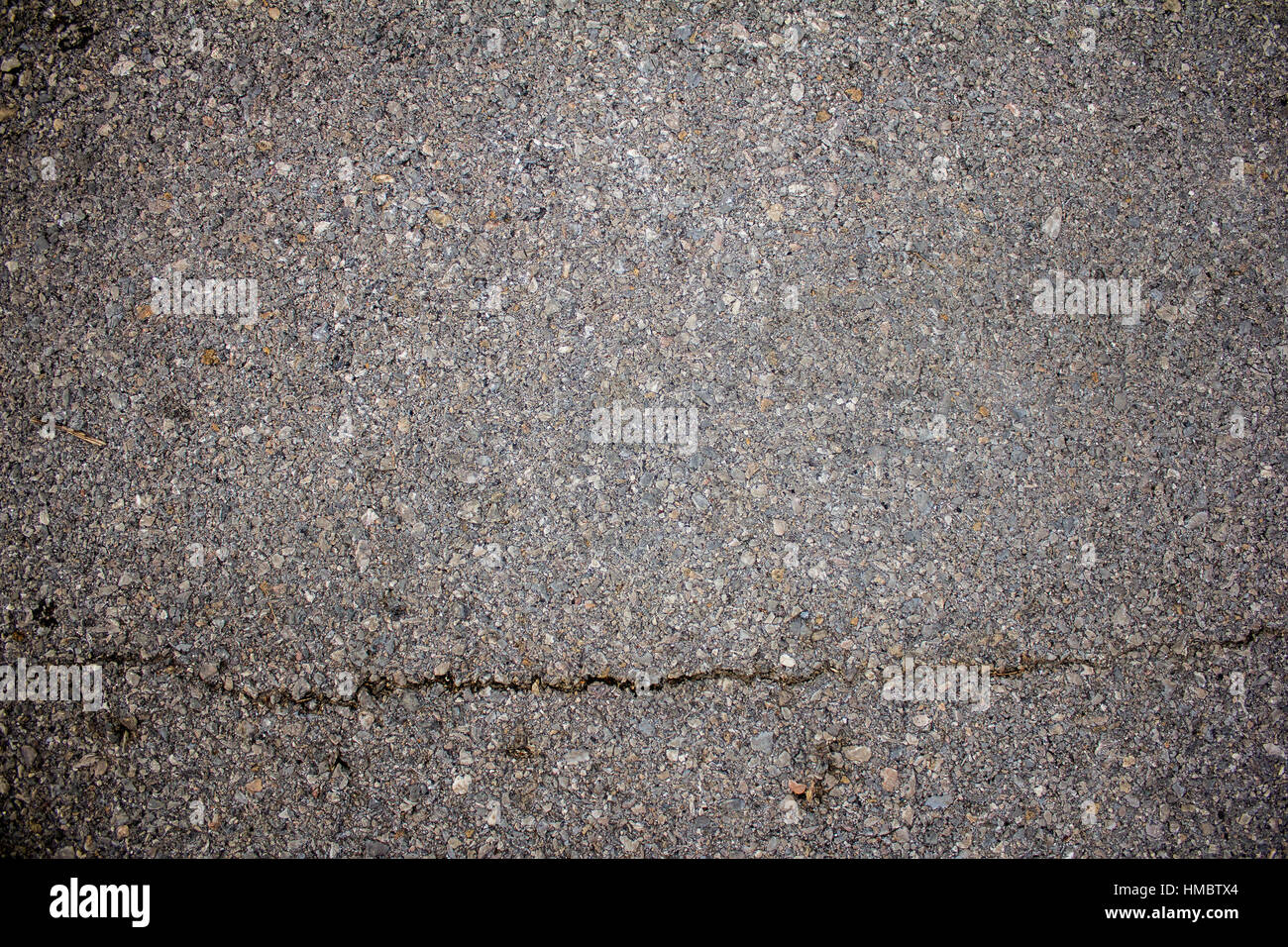 The cracked asphalt road texture for background Stock Photo - Alamy
