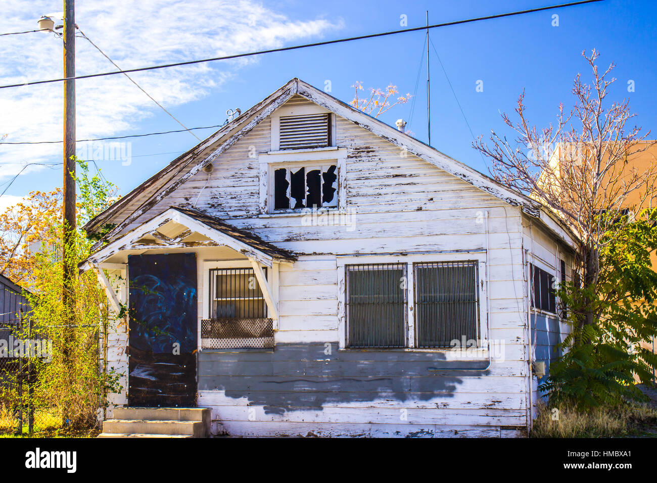 Abandoned Home In Disrepair With Barred Windows Stock Photo - Alamy