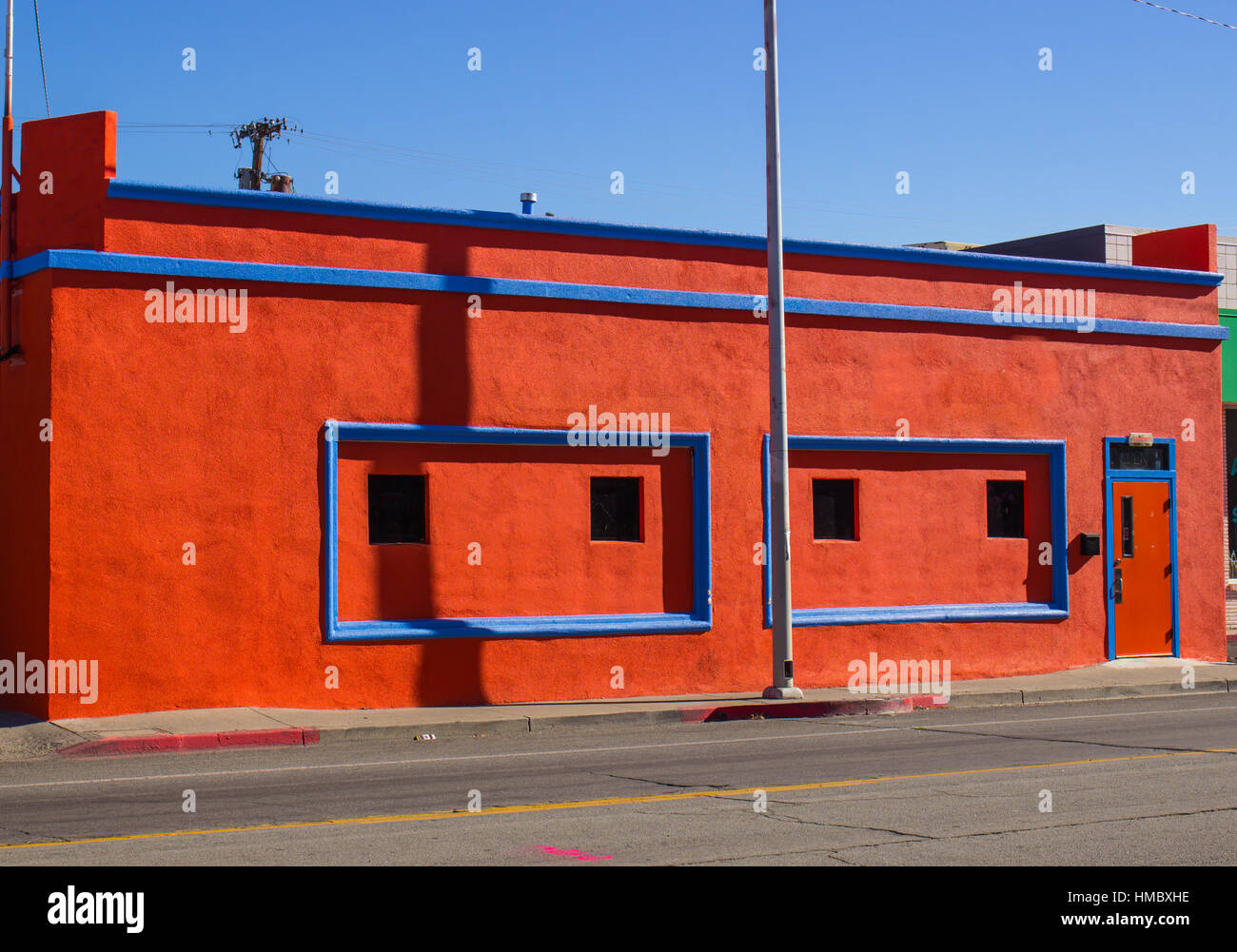 Bright Orange Building With Blue Trim Stock Photo - Alamy