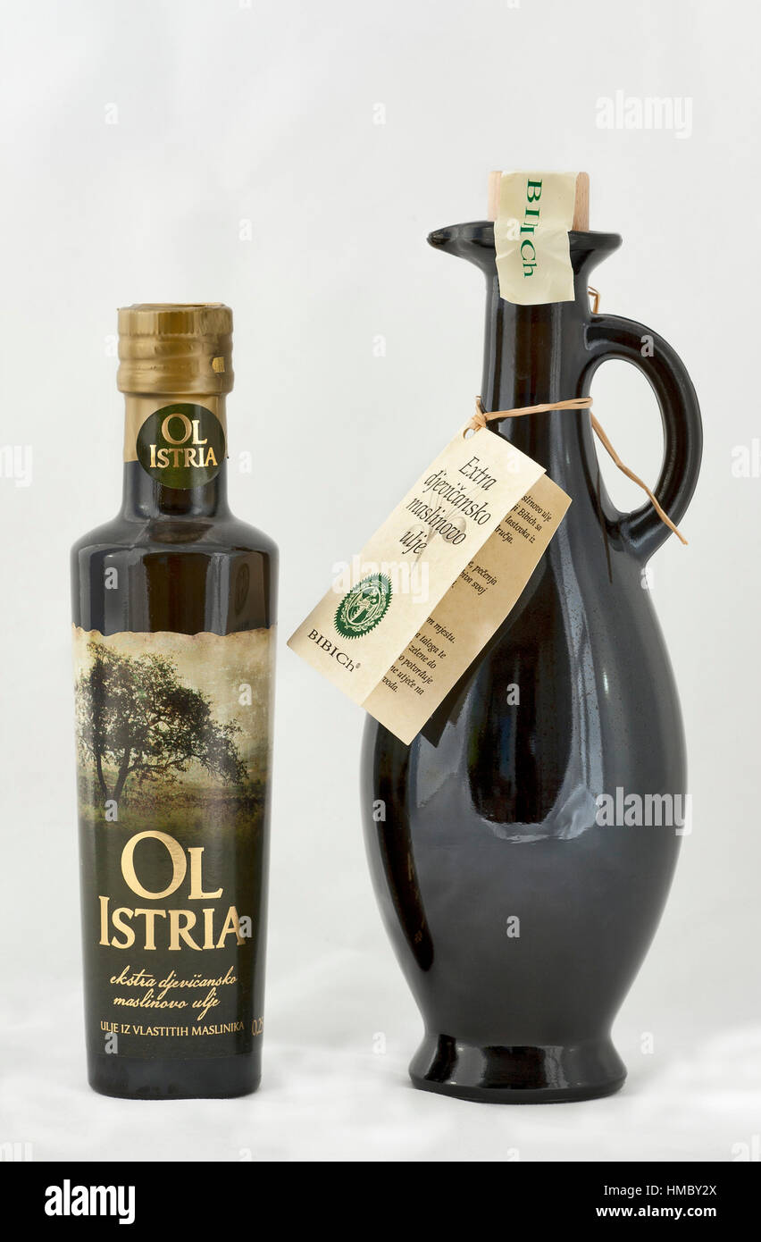 VRSAR, CROATIA - AUGUST 27, 2011: Dark bottles of Ol Istria and Bibich ...