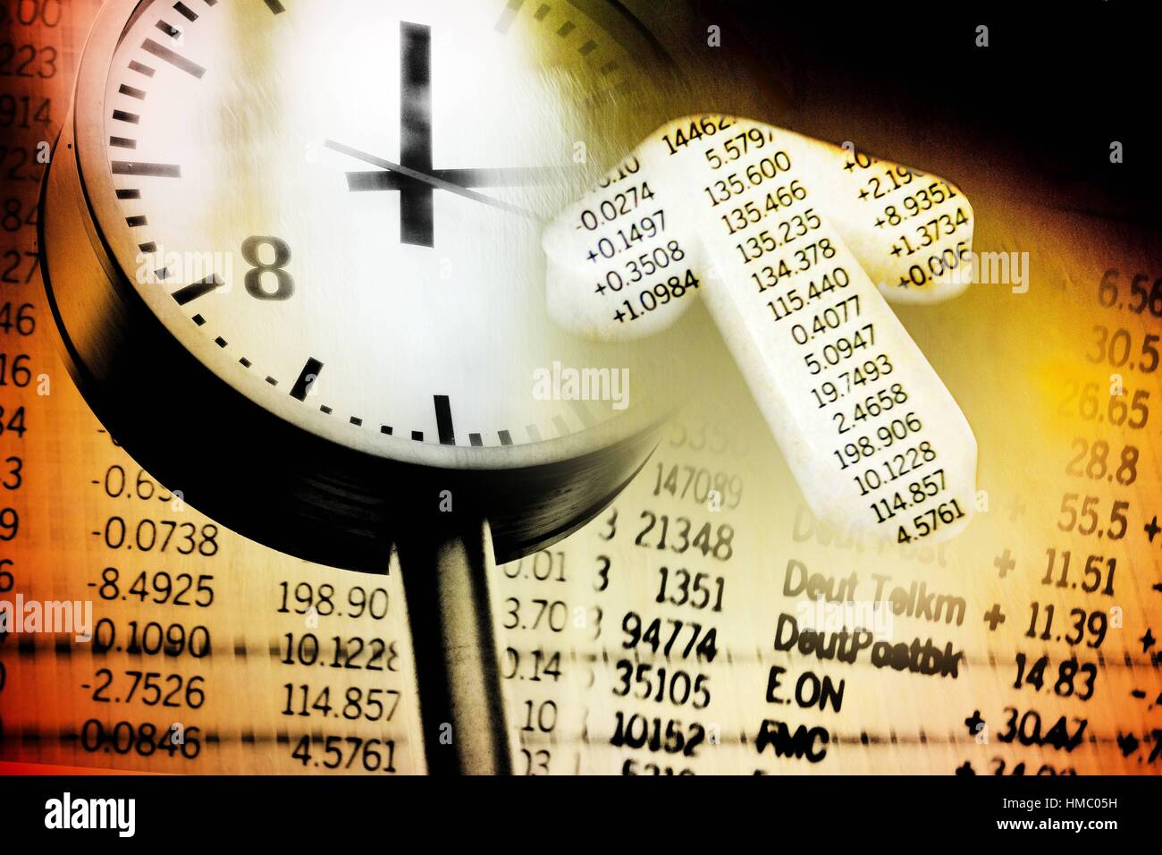 digital composition of a clock with a stock market newspaper on the ...