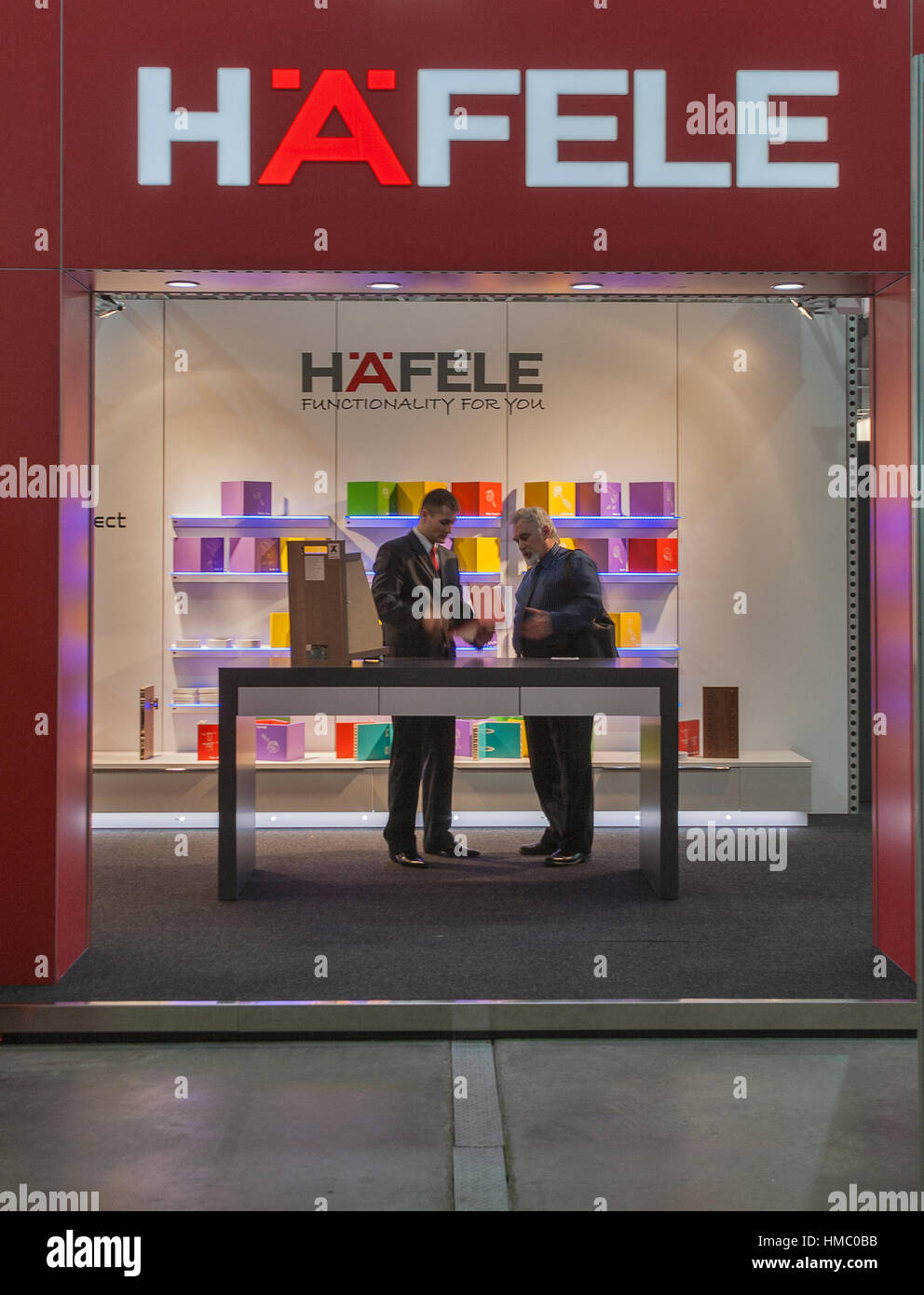 Visitors visit Hafele furniture company booth during Kiev International ...