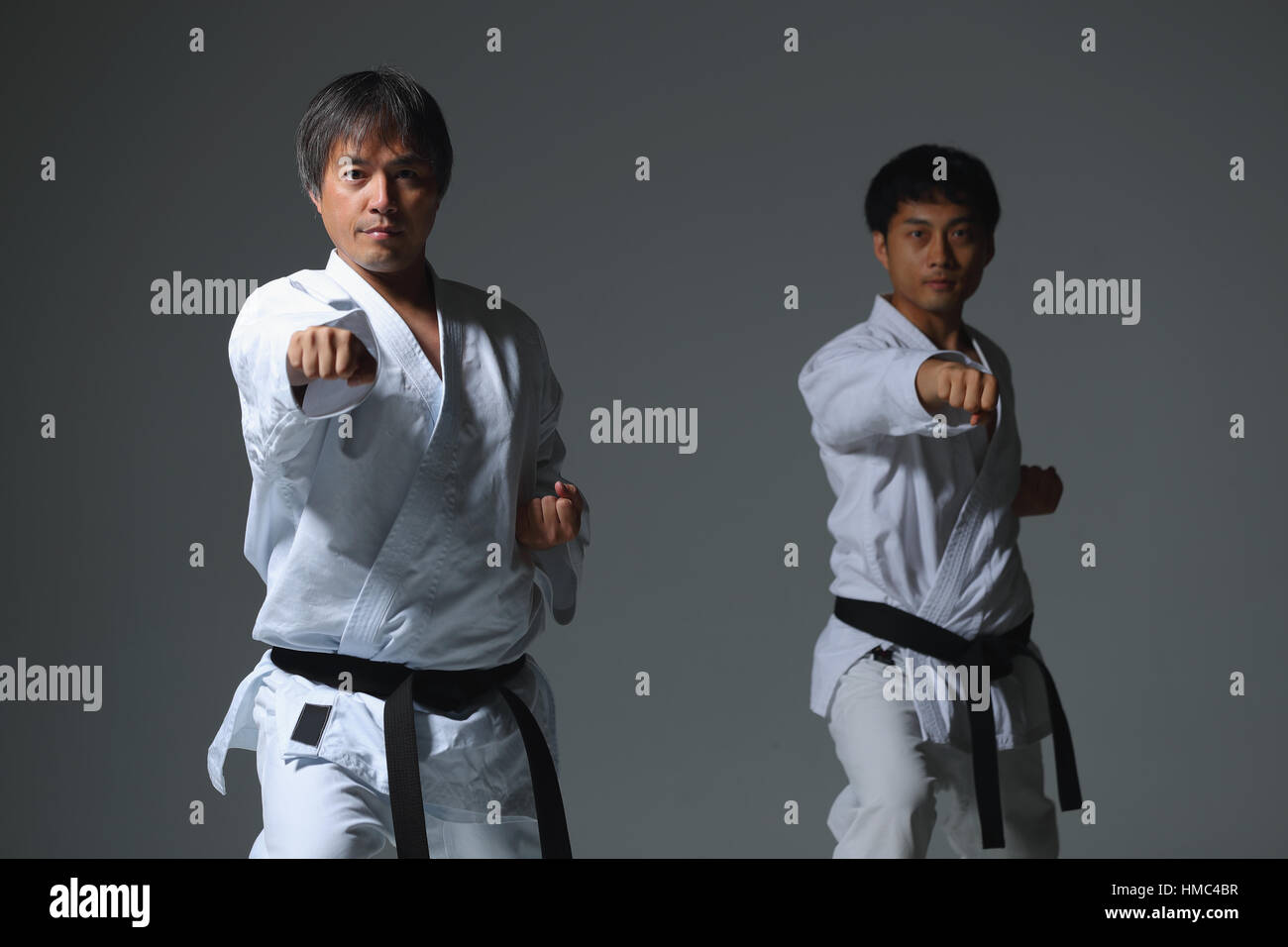 Japanese karate masters fighting Stock Photo - Alamy