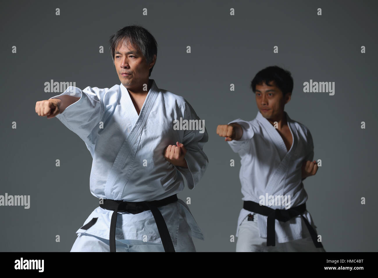 Japanese karate masters fighting Stock Photo - Alamy