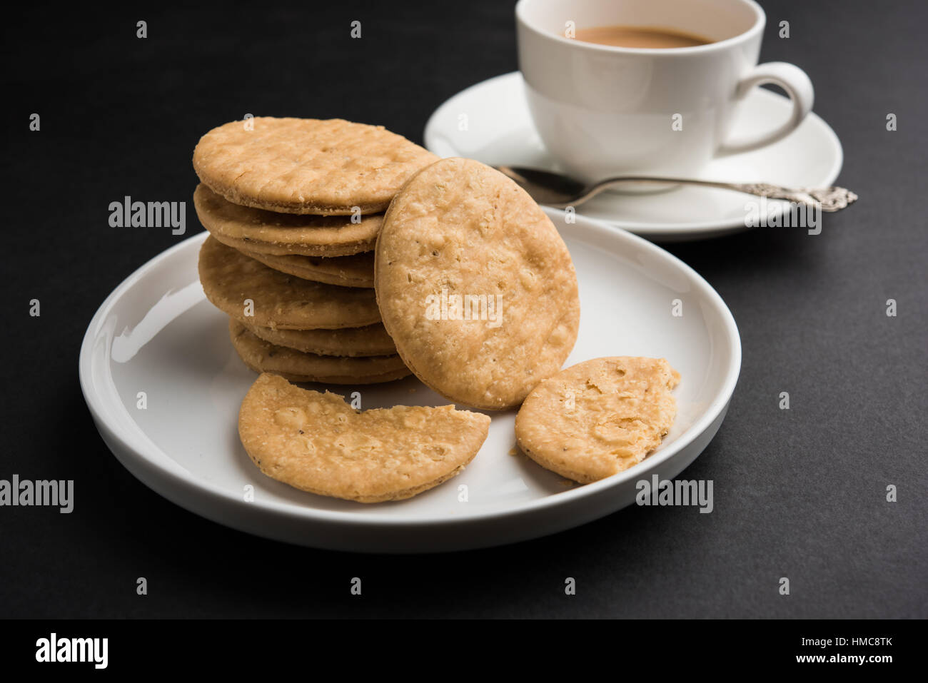 spicy fried mathri or mathari which is an indian snack served with a ...