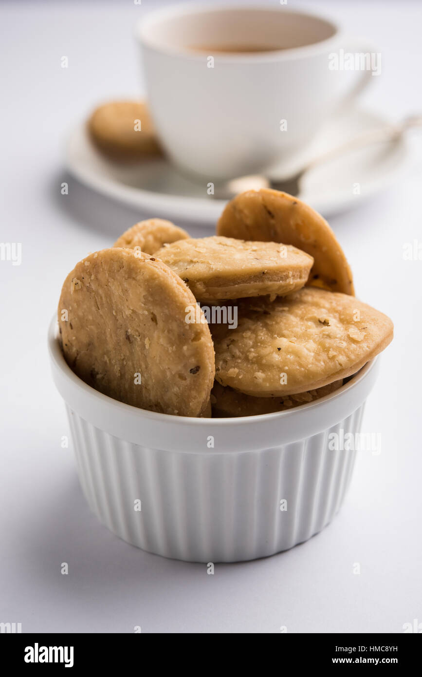 spicy fried mathri or mathari which is an indian snack served with a ...